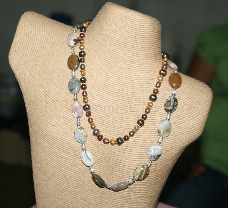 Necklaces Displayed on the Neck of a Mannequin Stock Photo - Image of ...