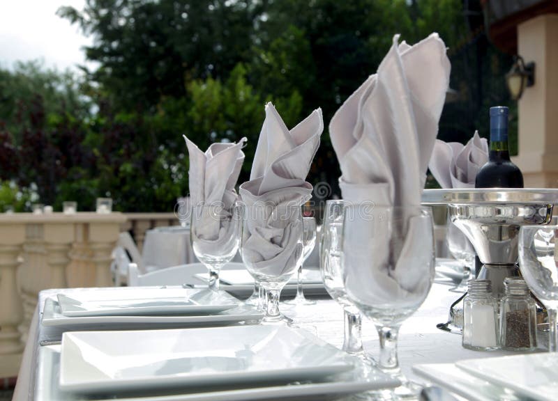 Fancy white table settings stock photo. Image of trees - 25773052