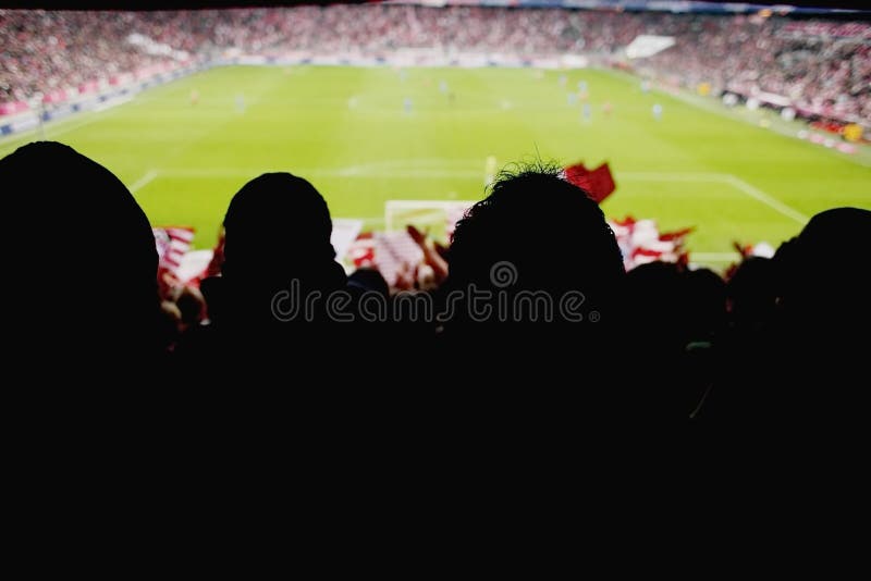 Fans cheering soccer game stock photo. Image of field - 81825882