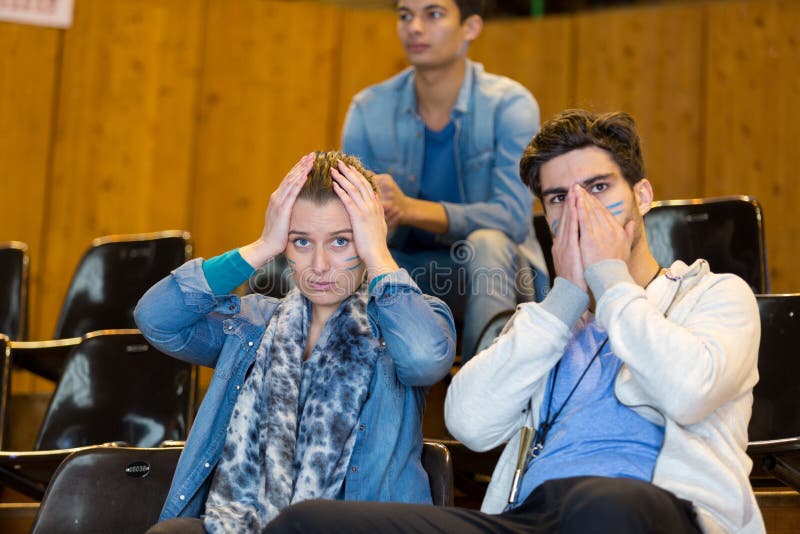 Fans Club with Disappointed Facial Expression Stock Image - Image of ...