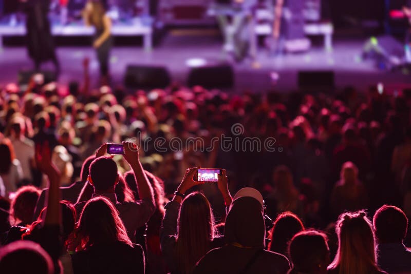 Fans at the concert editorial photo. Image of dusk, camera - 97515081