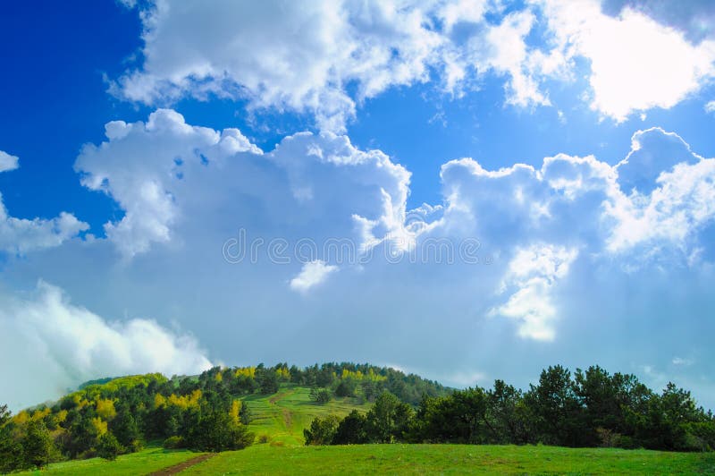 Fantastic Cloudy Sky Over the Forest and Hill Stock Image - Image of ...