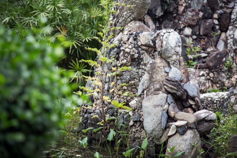 Fantastic Stone Arranging As Human Shape on Sitting Action Stock Photo ...
