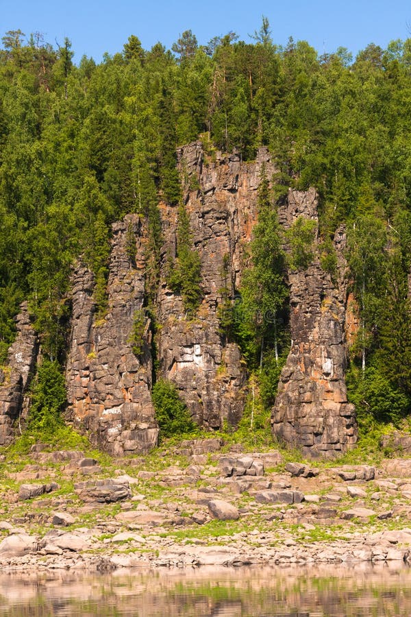 Fantastical Cliffs on the River. Around only Rocks and Trees Stock ...