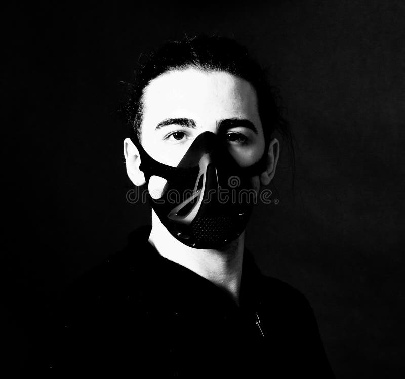 Young Male Model with Mask Posing in Studio. Fantasy, Halloween, Sci-Fi ...