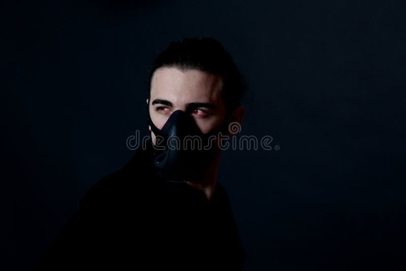 Young Male Model with Mask Posing in Studio. Fantasy, Halloween, Sci-Fi ...