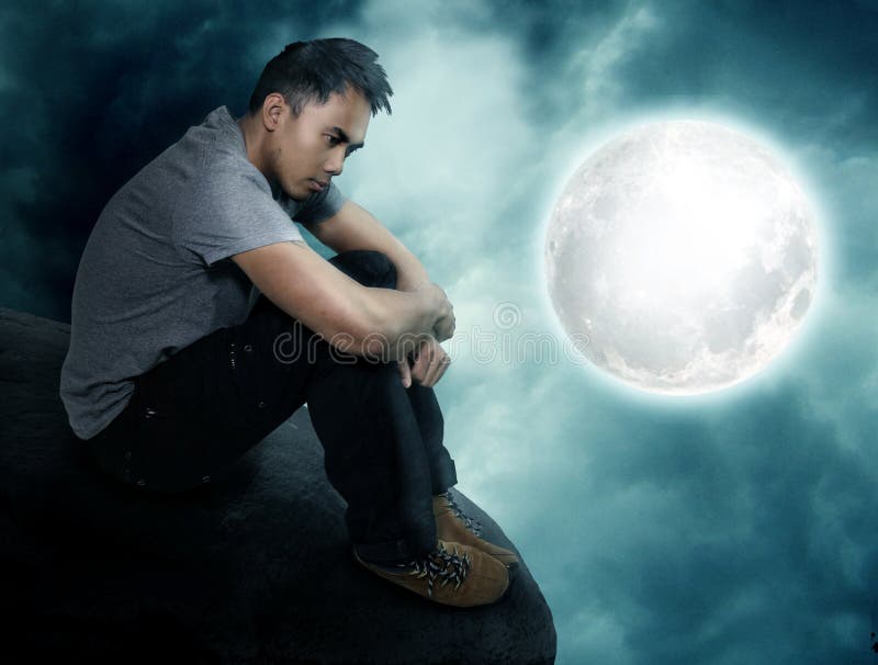 Fantasy World - Young Man Sitting at a Full Moon Stock Photo - Image of ...