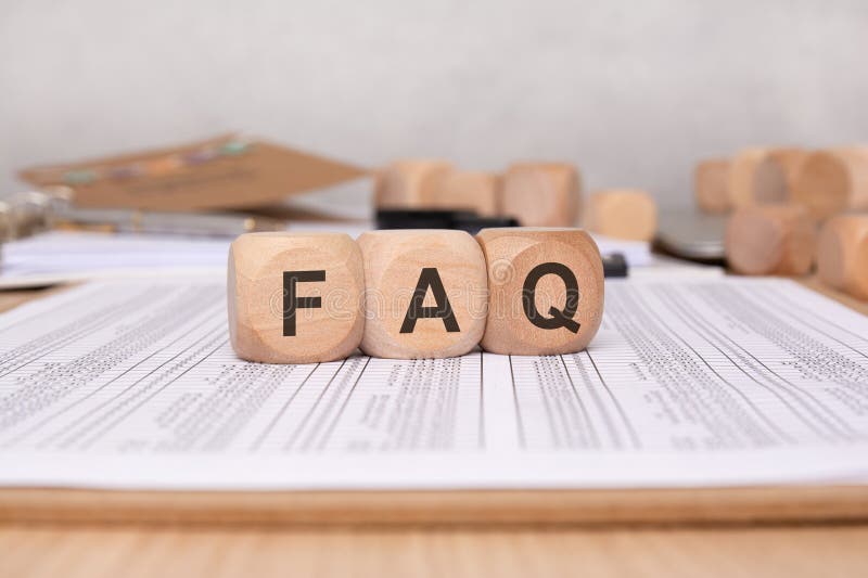 An FAQ Concept Utilizing Wooden Blocks Along with Organized Documents ...