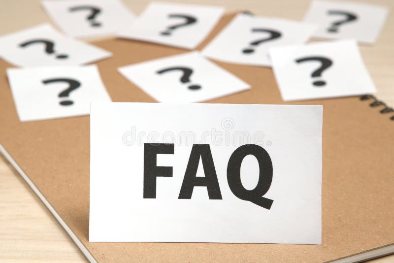 FAQ on a Piece of Paper and Many Question Marks on Notebook. Stock ...