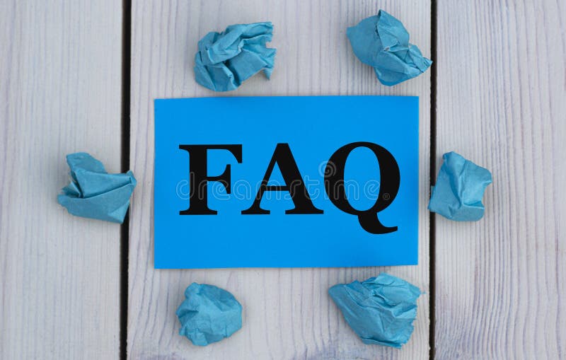 FAQ - Word on Blue Paper on a Light Background with Crumpled Pieces of ...