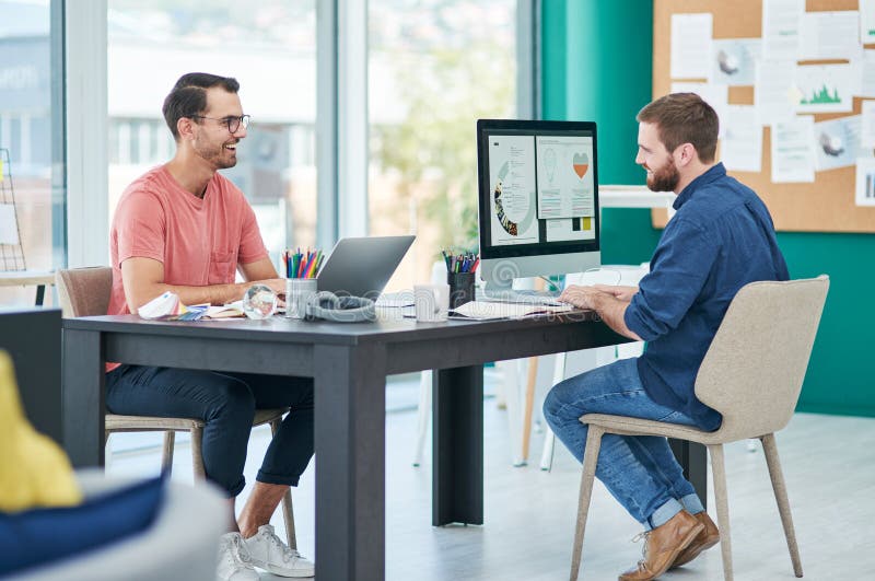 Far from the Days of Uncomfortable Office Cubicles. Two Young ...