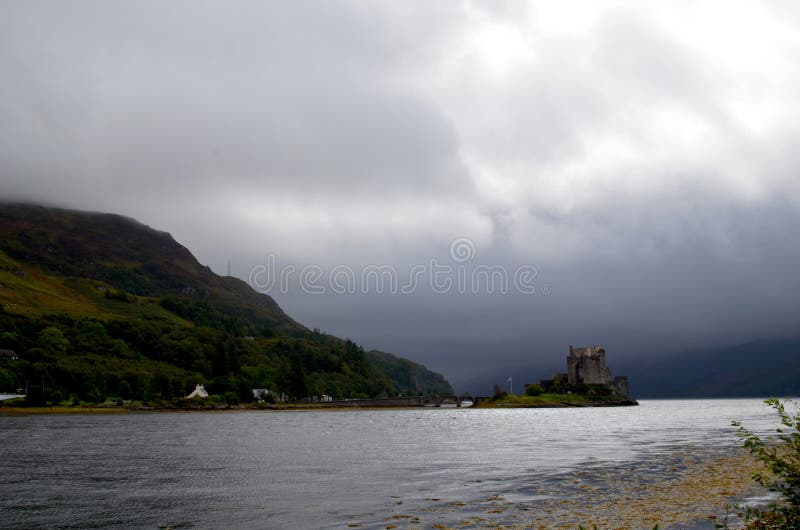 A Far Off Look at a Storm Over Eilean Donan Stock Image - Image of ...