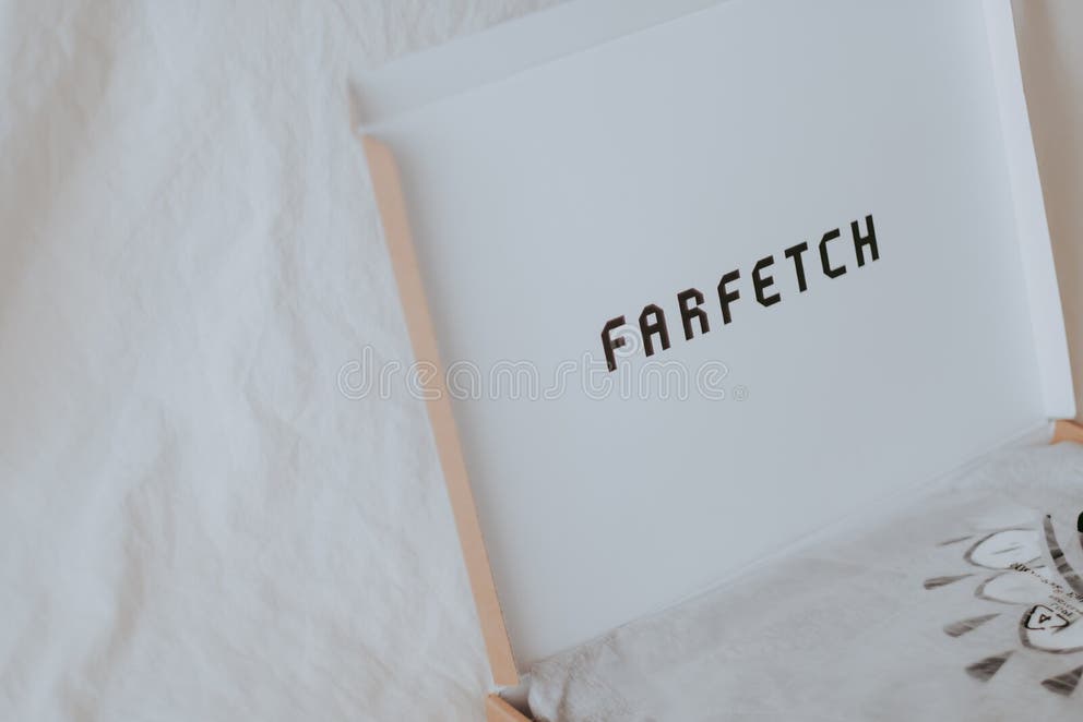 FARFETCH Online Luxury Clothing Store. Editorial Photo - Image of ...