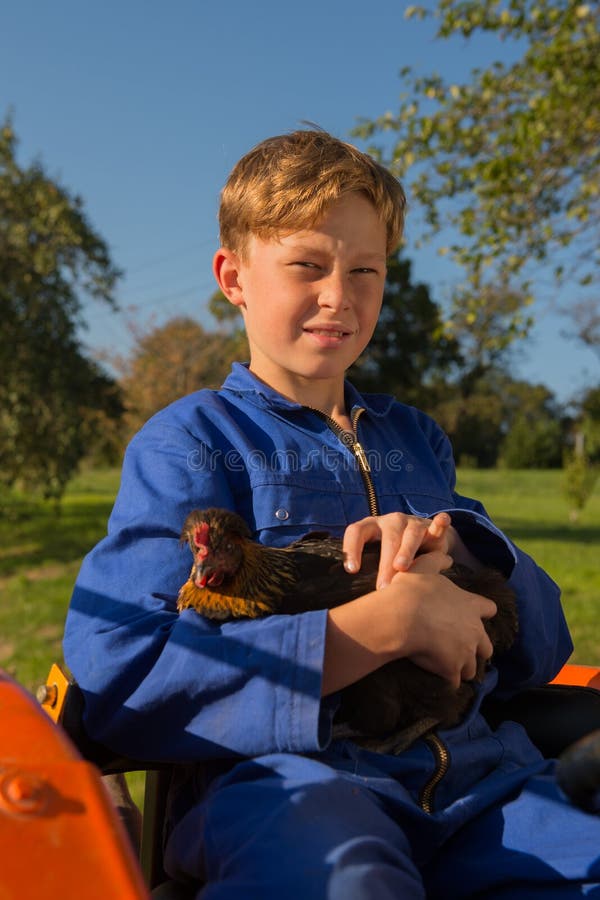 Farm Boy with tractor stock photo. Image of hind, child - 60121066