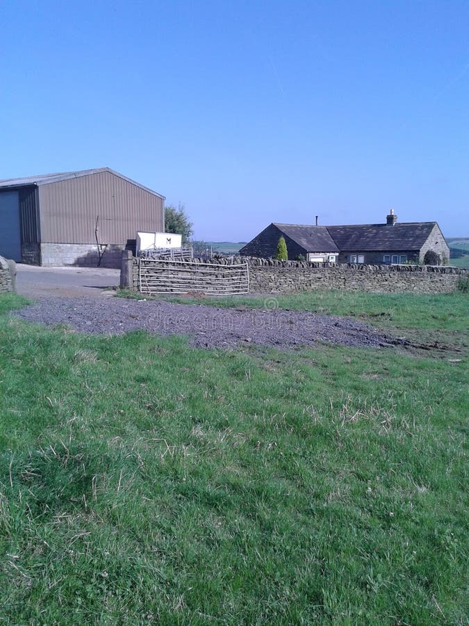 Farm buildings from field stock image. Image of uphill - 96534137