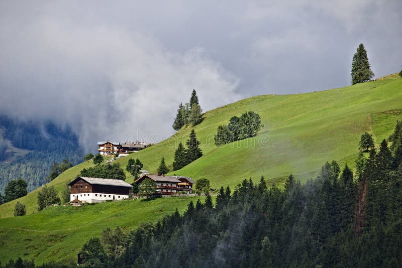 Ski slope in austrian alps stock image. Image of tourist - 17992883