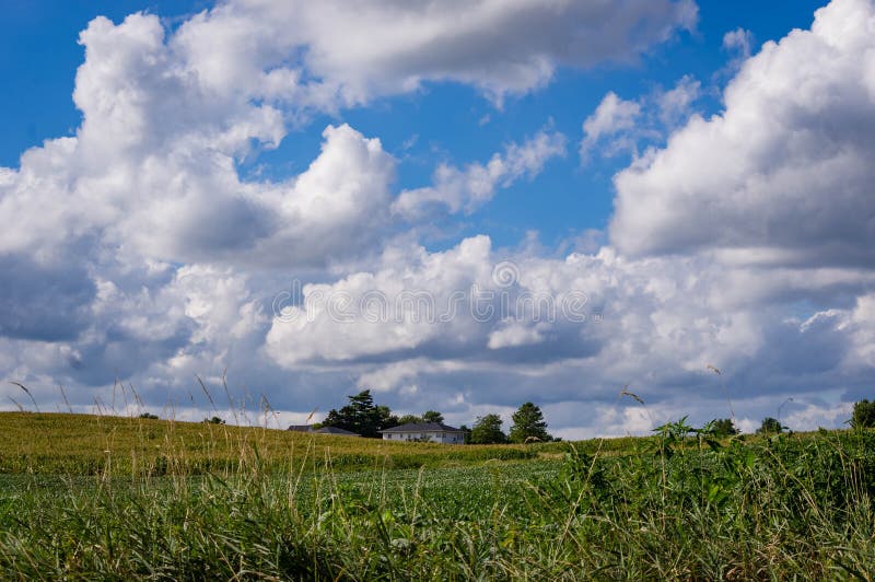 Cloudy Farm Countryside stock photo. Image of land, peaceful - 134613622