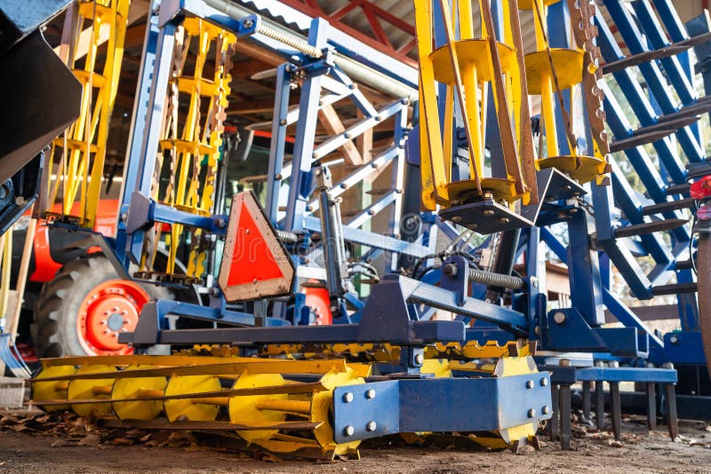Farm Equipment Stored in a Shed Stock Photo - Image of rural, plow ...