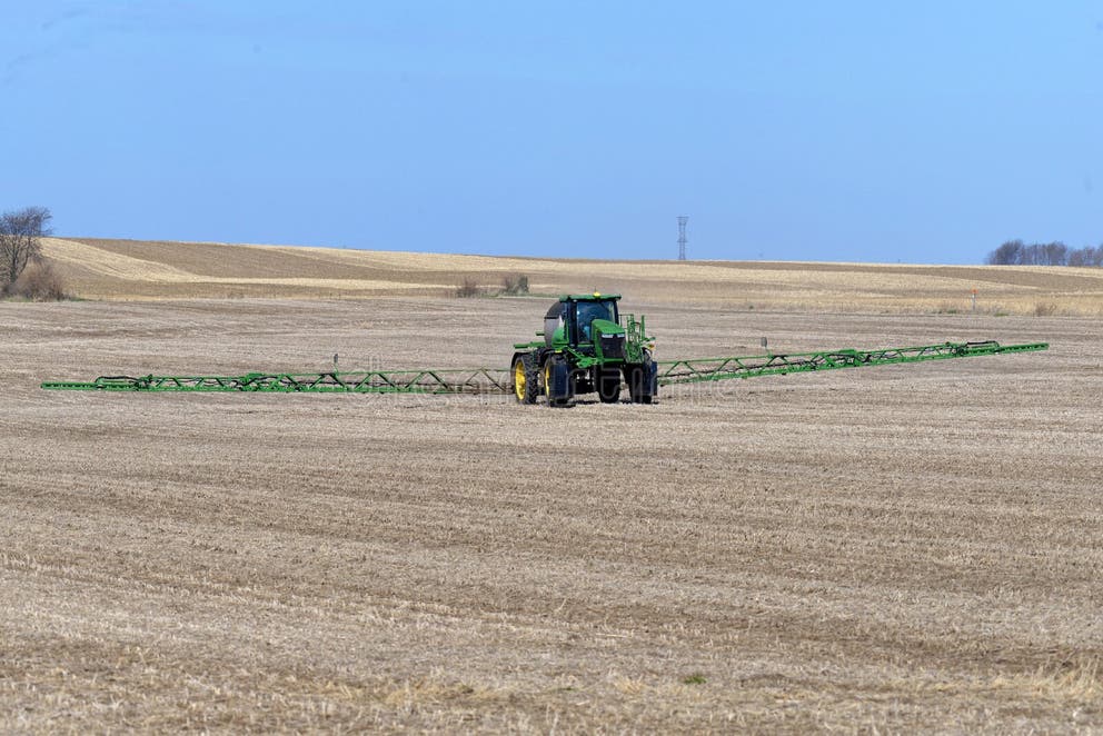 Farm Field Being Sprayed in the Spring Editorial Photography - Image of ...