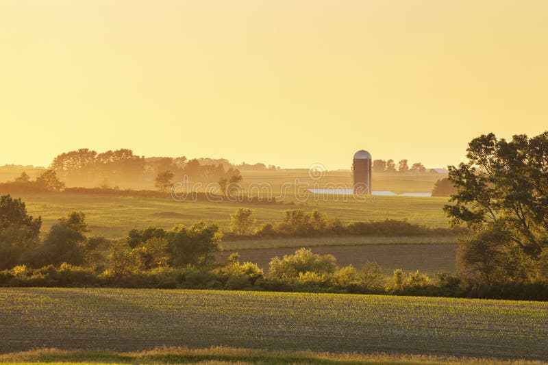 Farm and Fields and Trees at Sunset in Northeastern Iowa during the ...