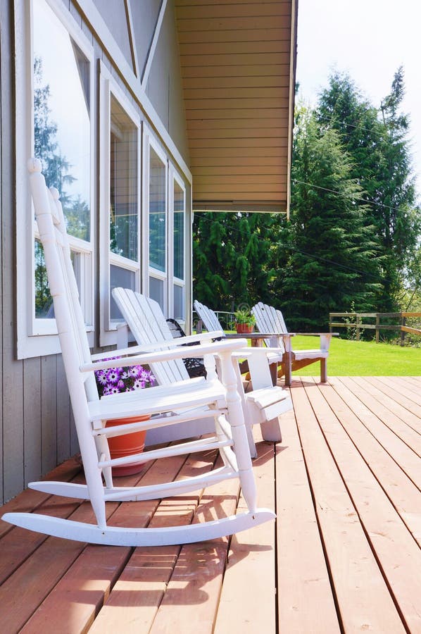 Farm House Open Front Deck with White Chairs. Stock Image - Image of ...