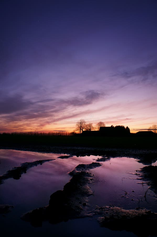 Farm house and puddle stock image. Image of purple, silhouette - 25224905
