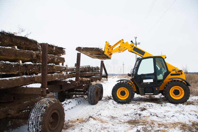 Farm loader at work stock image. Image of farm, machinery - 196891275