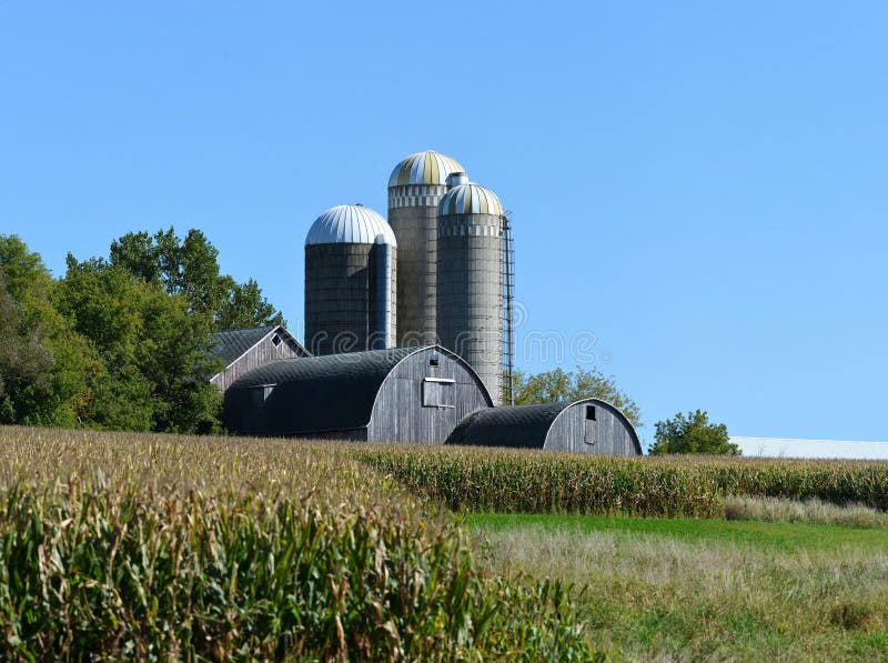 Farm Scene with Silos Behind a 3 Section Barn in Southern Wisconsin ...