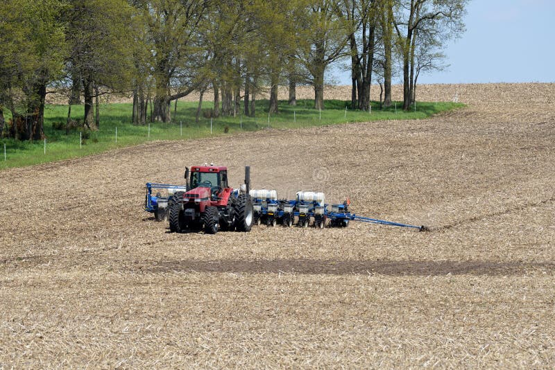 Farm Scene with a Tractor Seeding Farm Fields Stock Image - Image of ...