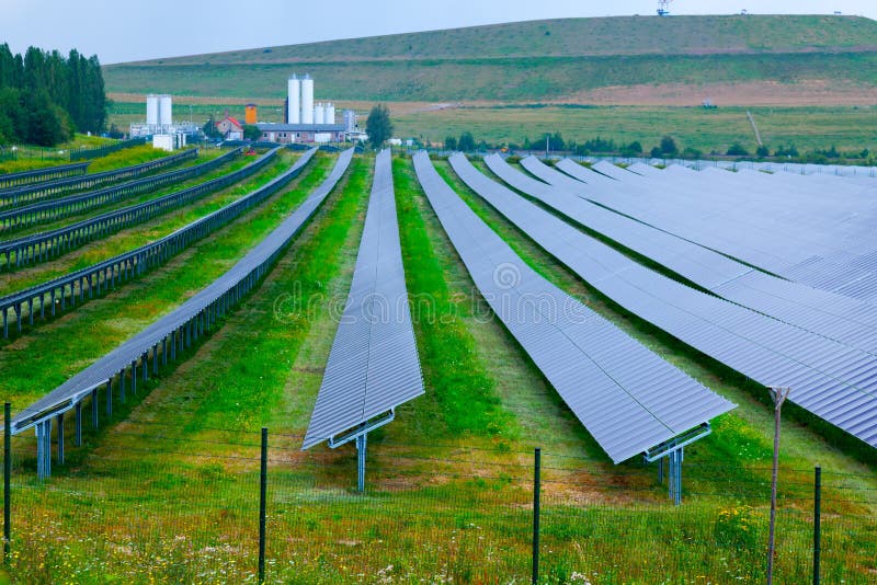 Farm with Solar Electric Panels on a Green Field Stock Image - Image of ...