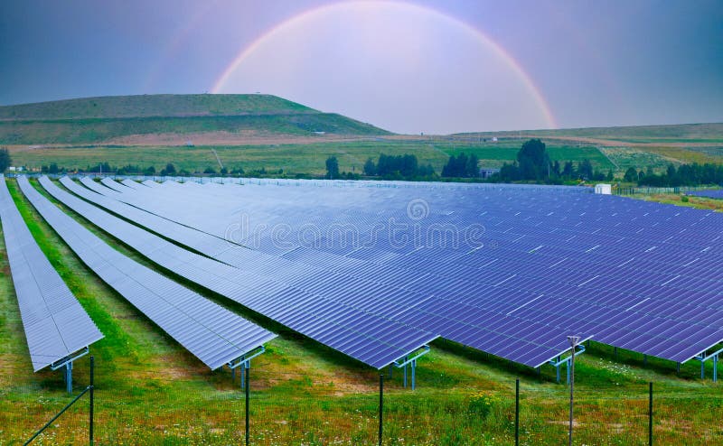 Farm with Solar Electric Panels on a Green Field Stock Image - Image of ...