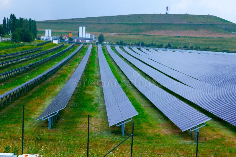Farm with Solar Electric Panels on a Green Field Stock Image - Image of ...