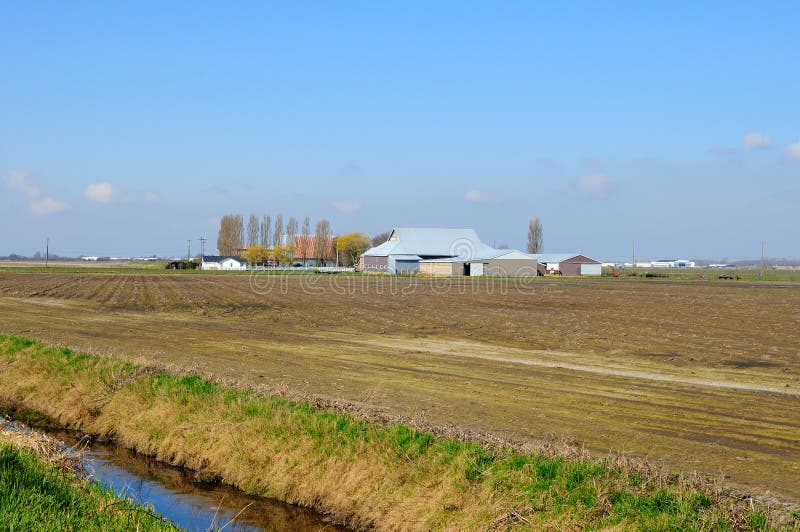 A farm in springtime stock image. Image of clouds, delta - 30440507