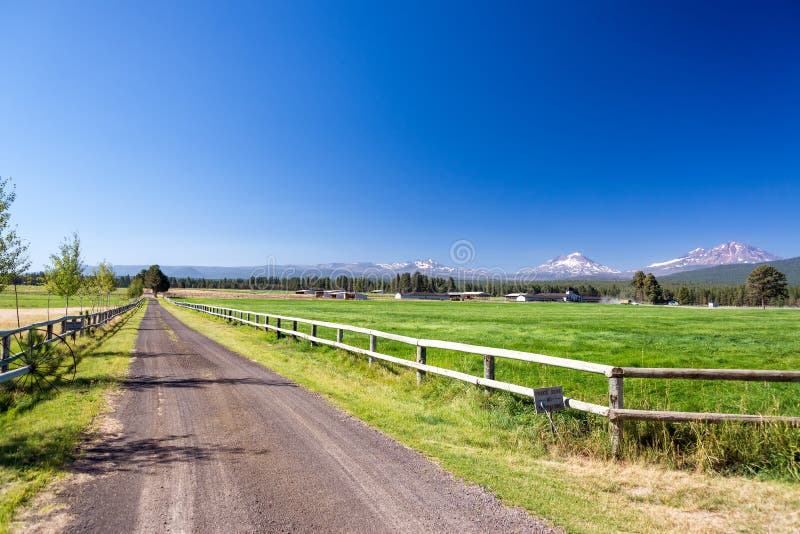 Farm and Three Sisters stock photo. Image of blue, natural - 134049730