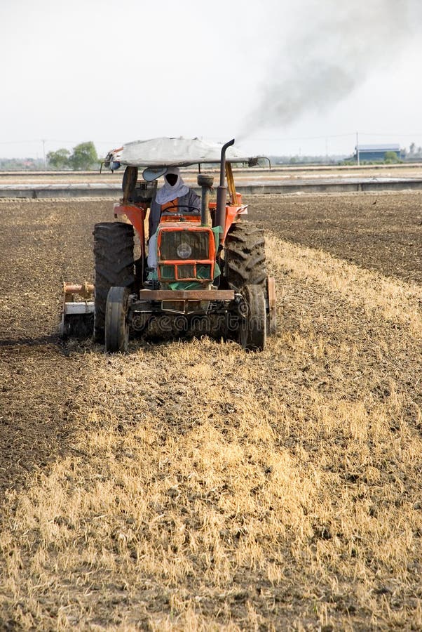 Farm Tractor stock photo. Image of working, farm, dust - 10525764