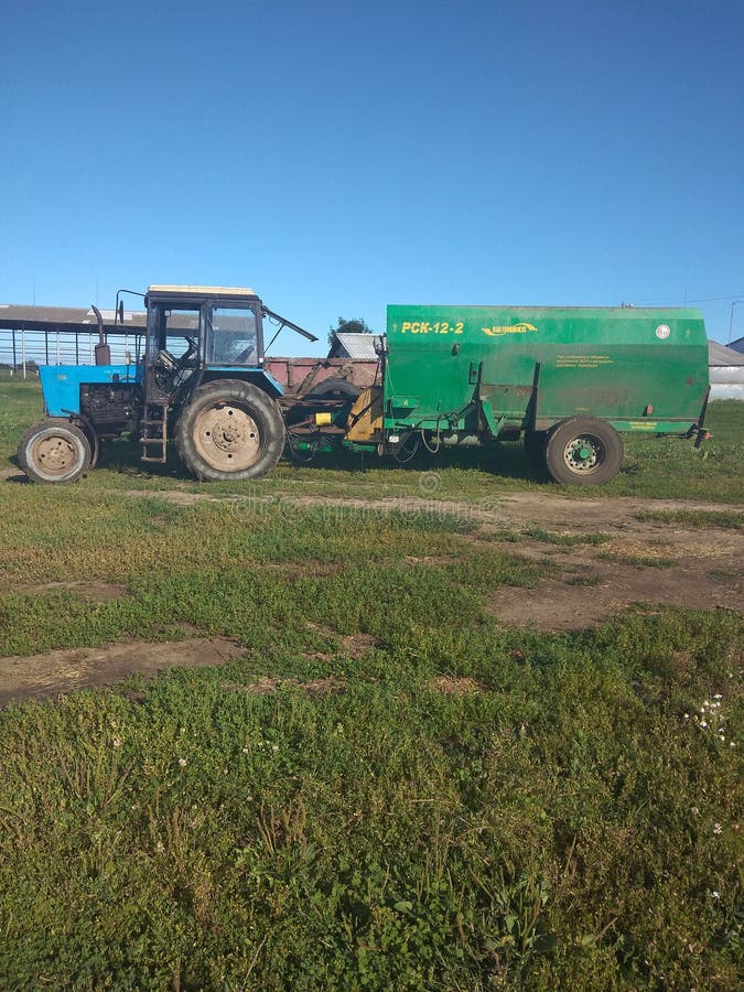 Farm Tractor Feeder editorial stock photo. Image of traktor - 207081143