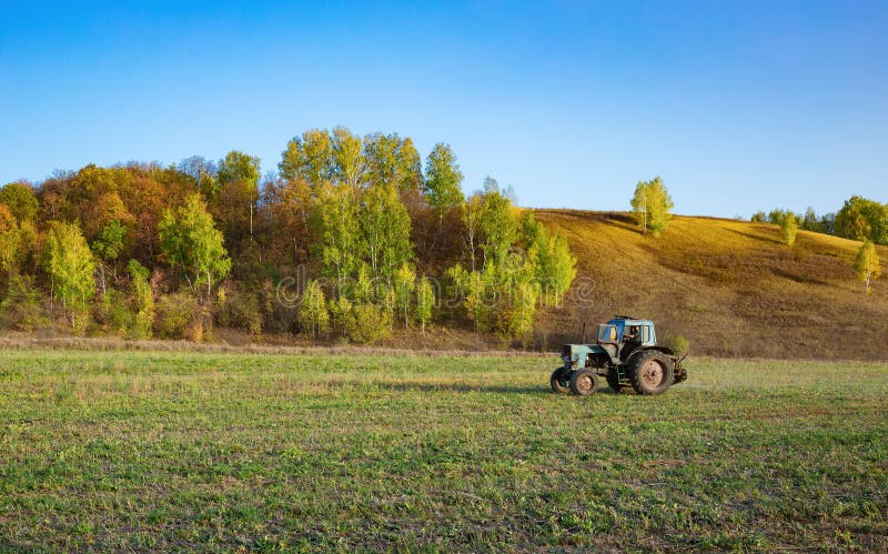 Farm Tractor on the Field in Europe Stock Photo - Image of nature ...