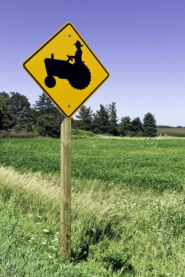 Farm tractor road sign stock image. Image of scenery - 26394233