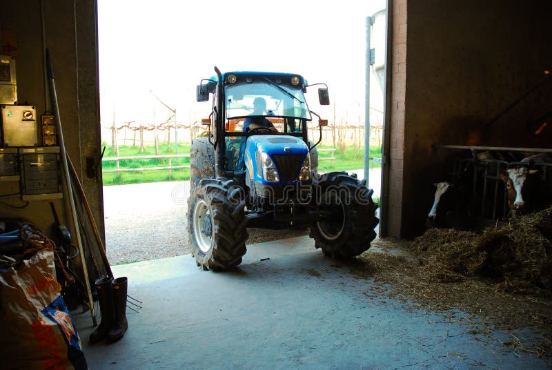 Farm tractor in rural area stock image. Image of island - 2119505