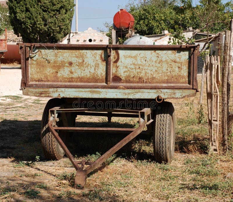Old rusted farm trailer stock photo. Image of brown - 166342456