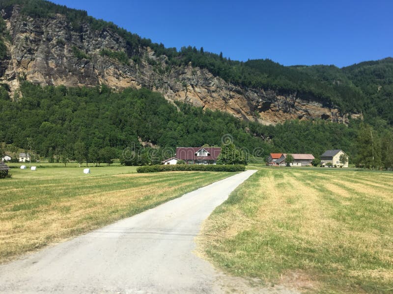 Farm under mountain stock photo. Image of forest, grass - 118817298