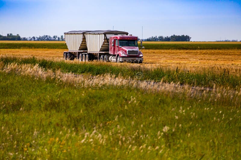 Farm Vehicles at Work in Crop Field Stock Photo - Image of heavy ...