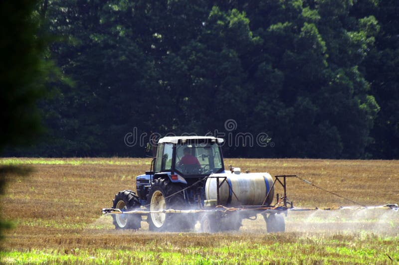 Farm Worker stock photo. Image of machinery, field, pesticide - 1946896