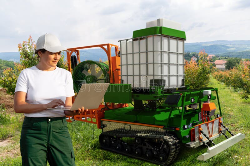 Farmer Controls Autonomous Robot Sprayer in a Fruit Garden. Smart ...