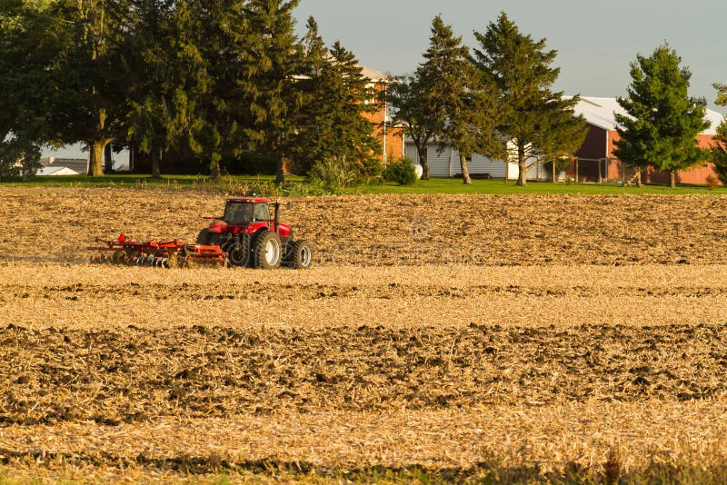 Farmer Discing His Field stock image. Image of meadow - 23633155