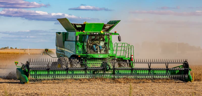 A Farmer Driving a Combine Harvester Editorial Photography - Image of ...