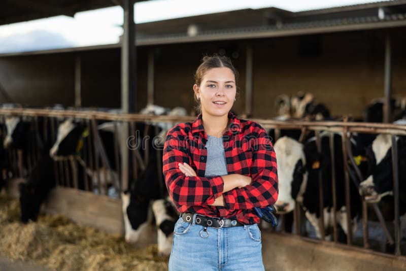 Farmer Engaged in Breeding of Cows Posing in Cowshed Stock Photo ... Farmer Engaged in Breeding of Cows Posing in Cowshed Stock Photo ...