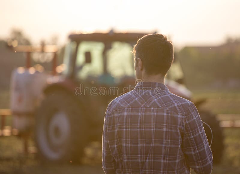 Farmer in Front of Tractor in Field Stock Image - Image of pesticides ...