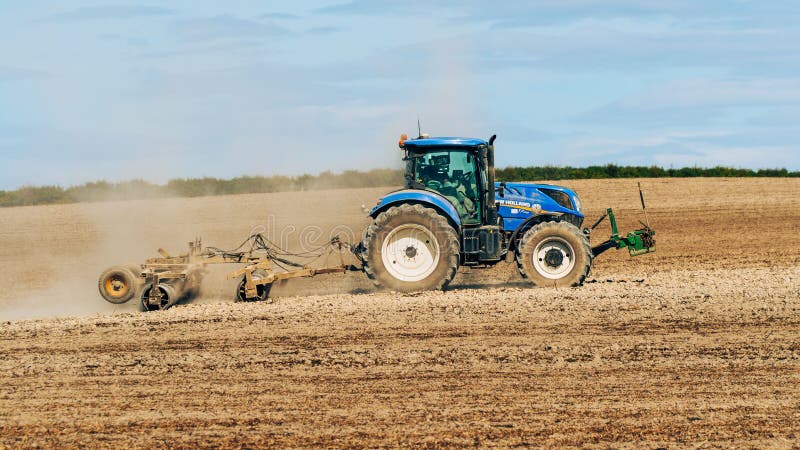Farmer and His Tractor Tending To His Field. Editorial Photography ...