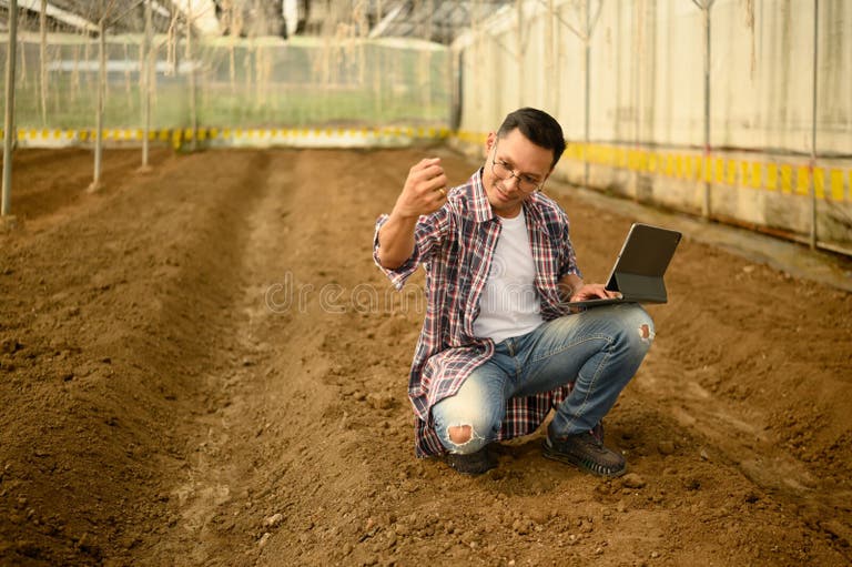 Farmer Inspecting Soil Texture and Composition, Preparing for Planting Stock Photo - Image of ...